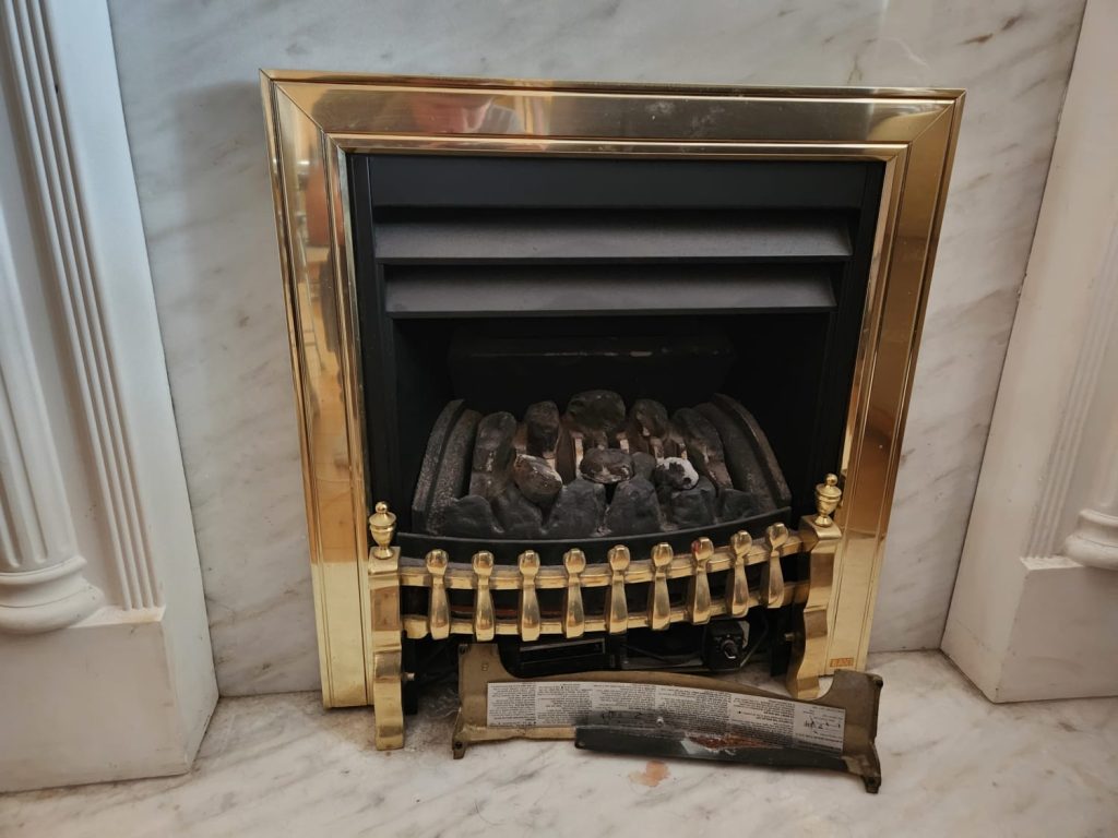 Replacing a back boiler gas fireplace with a wood multifuel burner in ...
